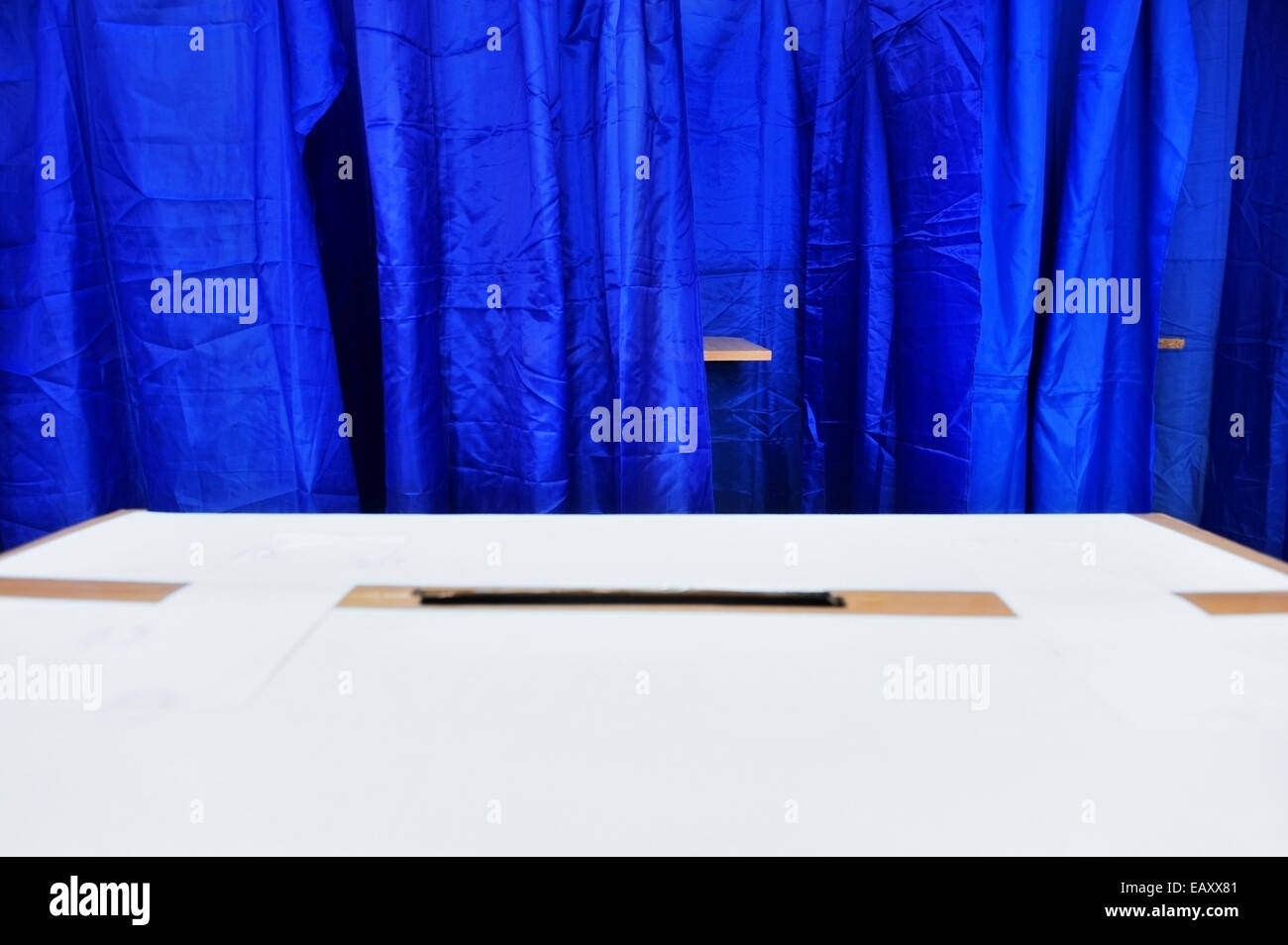 Empty vote booth and part of a ballot box are seen during election ...