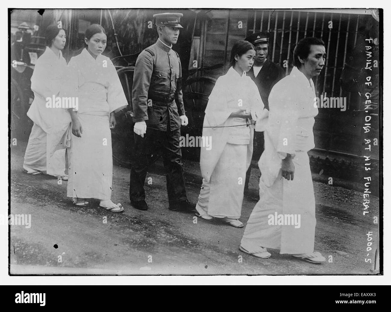 This photograph captures the family of General Oka at his funeral, a ...