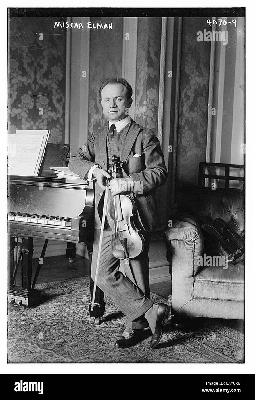 A photograph of the renowned violinist Mischa Elman holding his violin ...