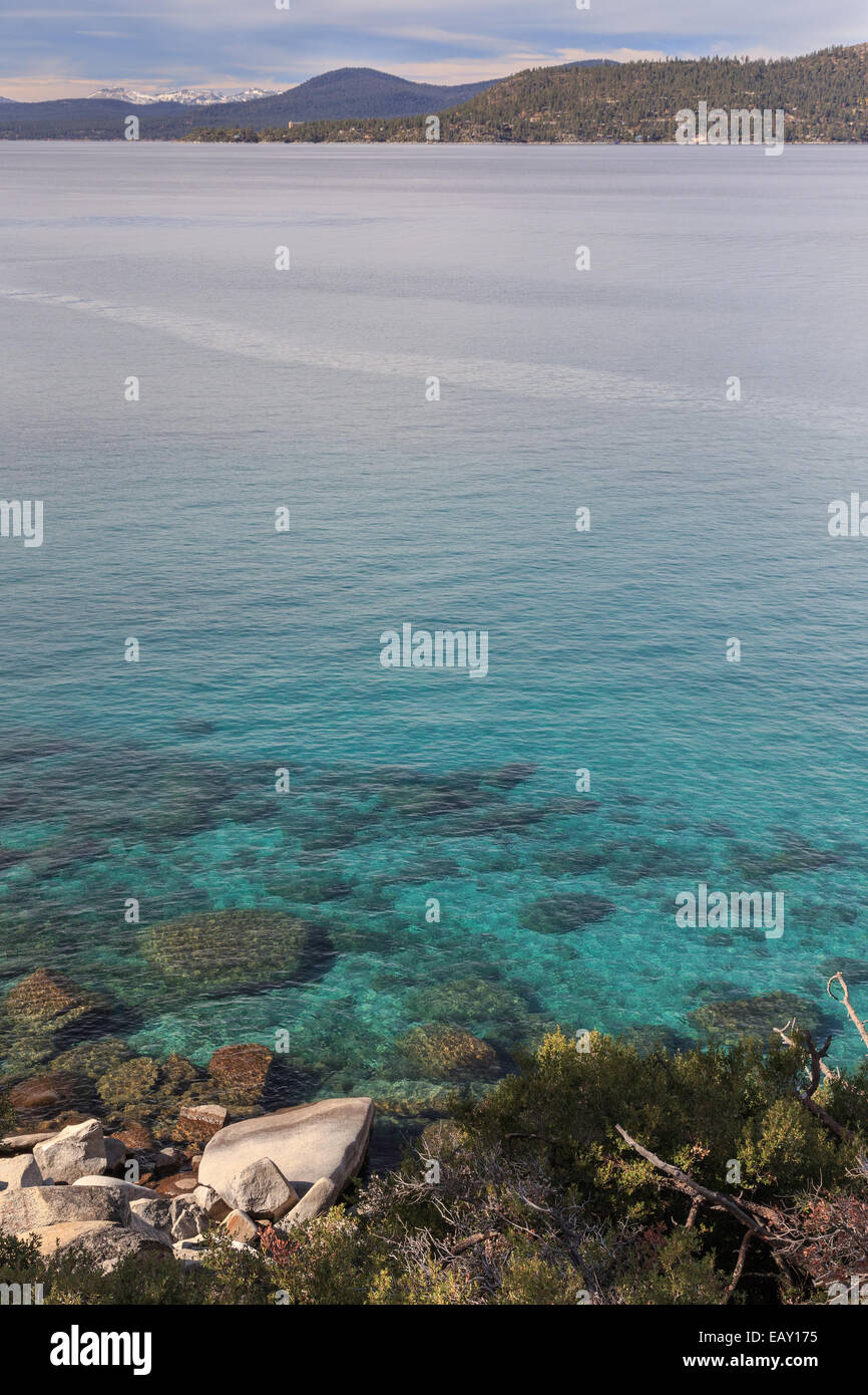 View of the the clear turquoise waters of Lake Tahoe from its shore ...