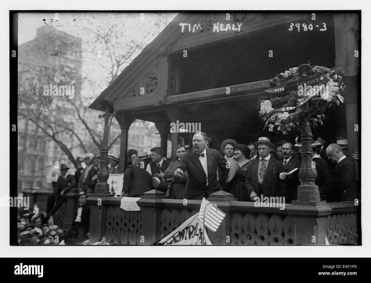 Tim Healy is seen speaking to a crowd in this image, demonstrating his ...