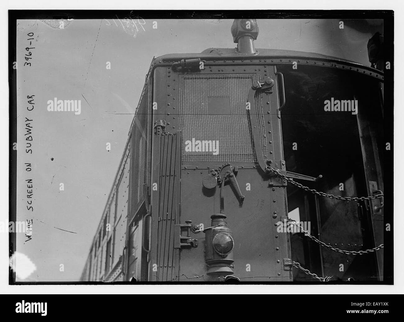 A close-up image of a wire screen inside subway car 147. The photo ...