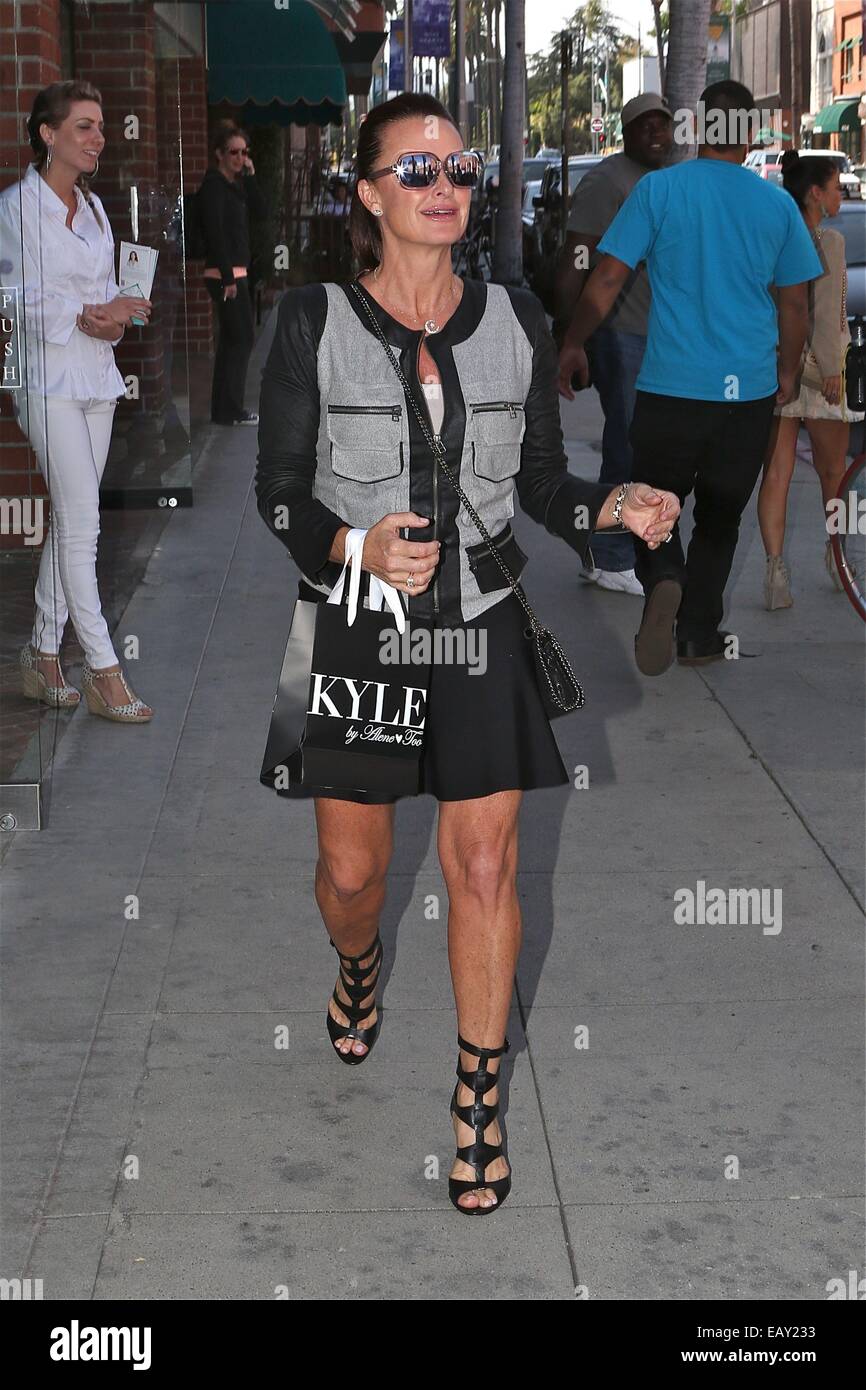 Kyle Richards in fashion outfit in beverly Hills after shopping at her ...
