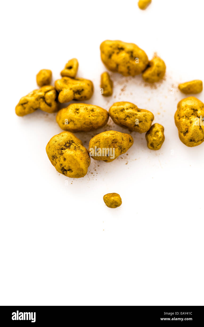 Chocolate covered cocoa beans in gold dust Stock Photo - Alamy