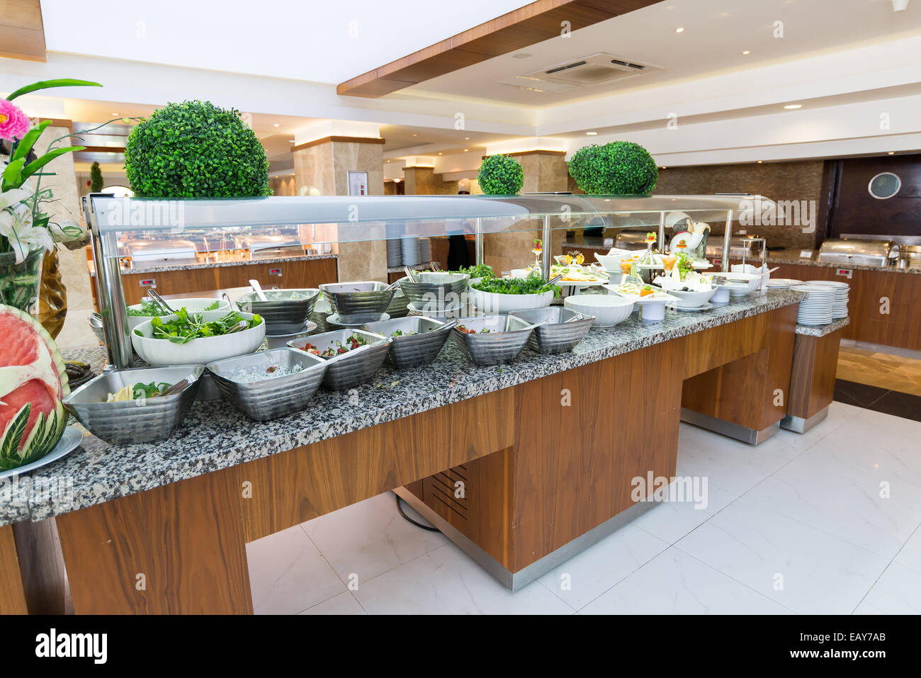 Buffet is a portioned salads on table Stock Photo - Alamy