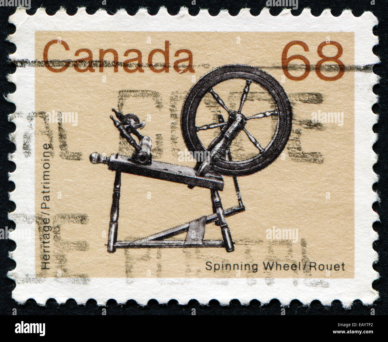 CANADA - CIRCA 1985: a stamp printed in the Canada shows Spinning Wheel ...