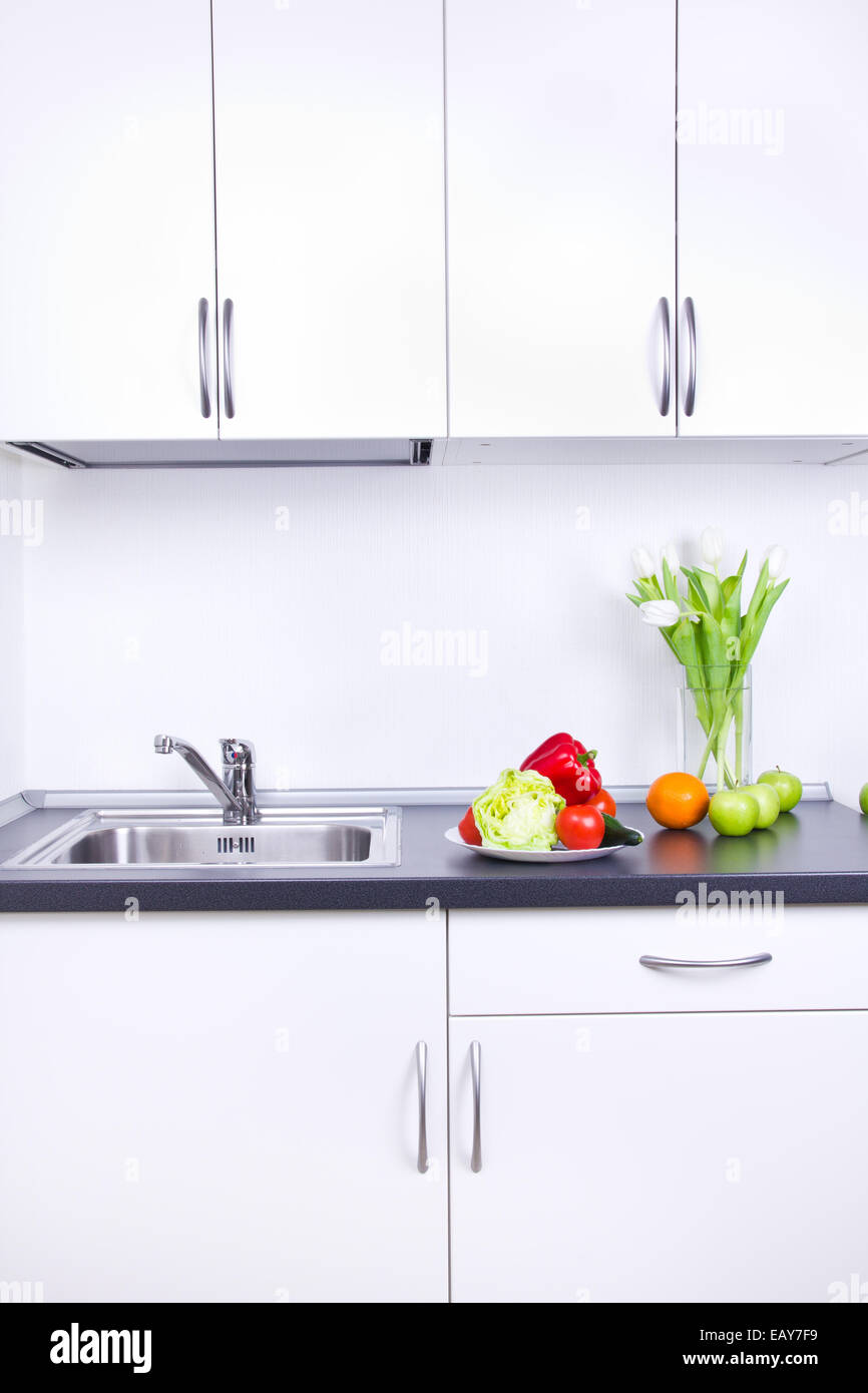 Vegan food in white kitchen interior Stock Photo - Alamy