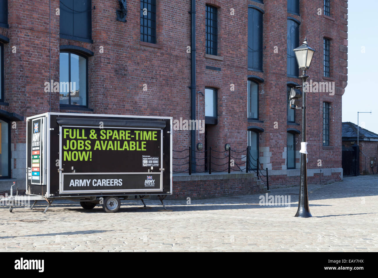 A 2013 British army recruitment poster on the side of a trailer in ...
