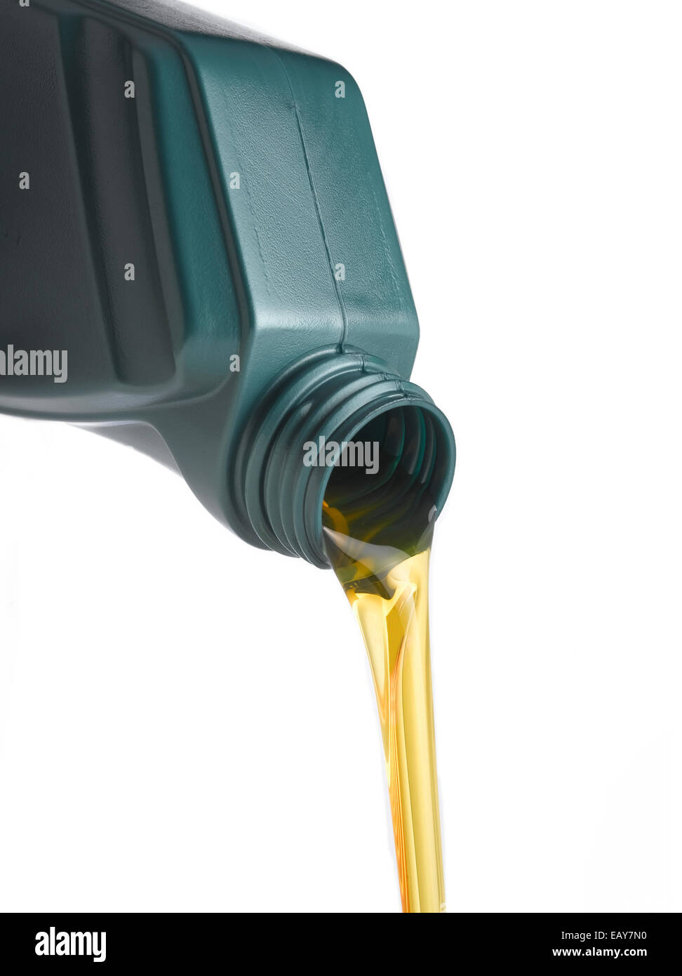 Oil can pouring Stock Photo - Alamy