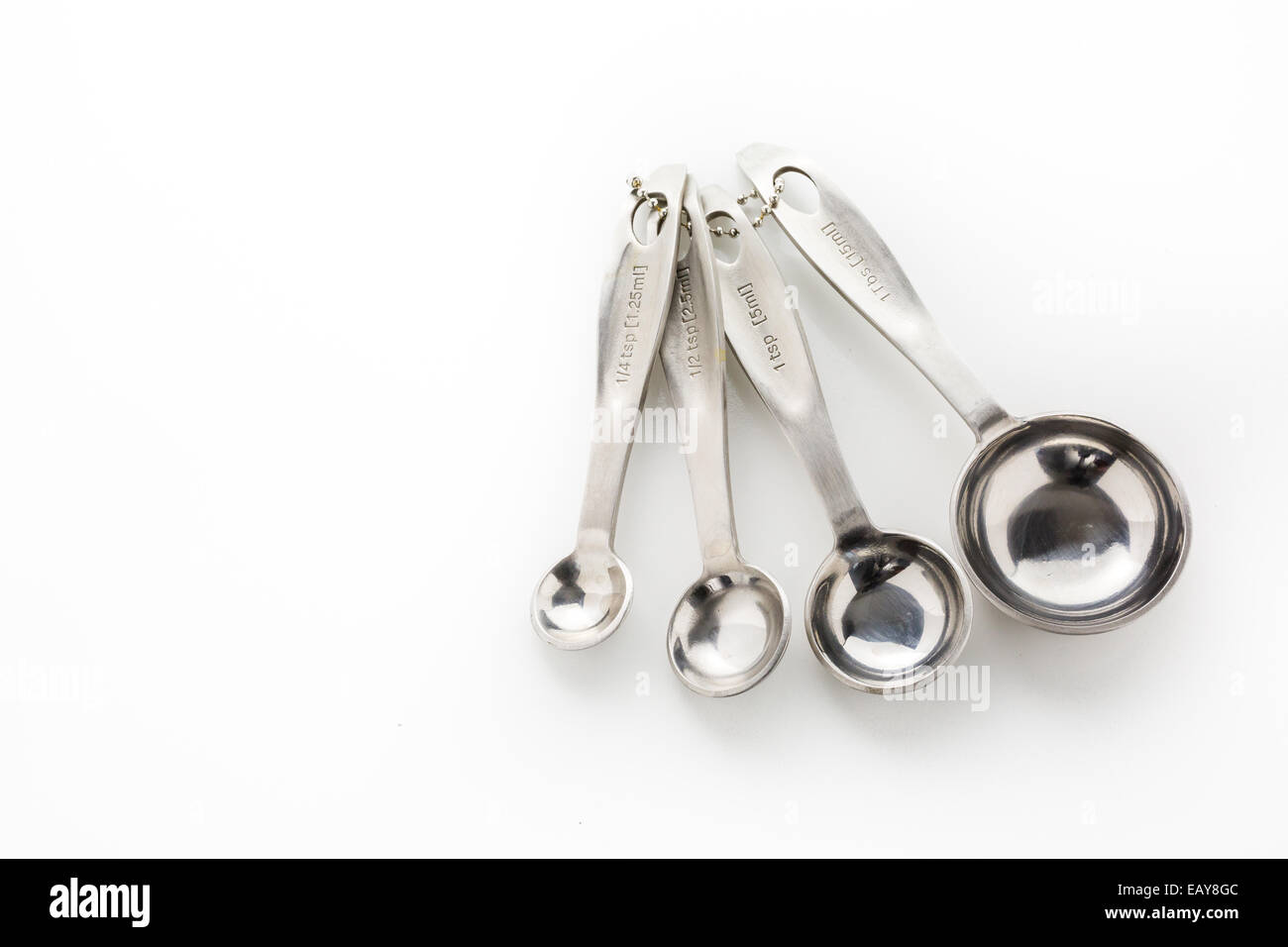 Measuring cups and spoons on the table Stock Photo - Alamy