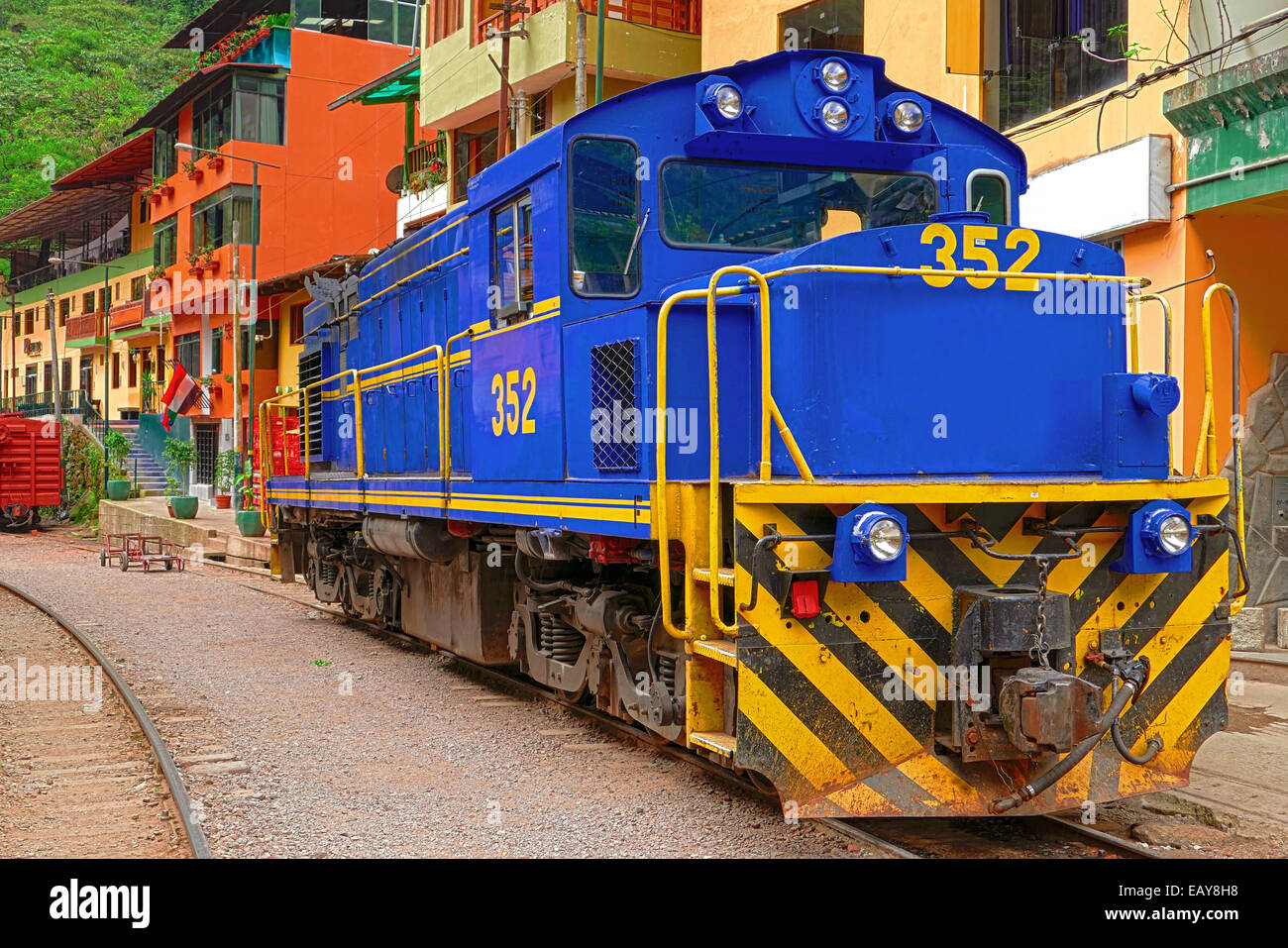 Locomotive stands at the railway station of "Aguas Calientes", the ...
