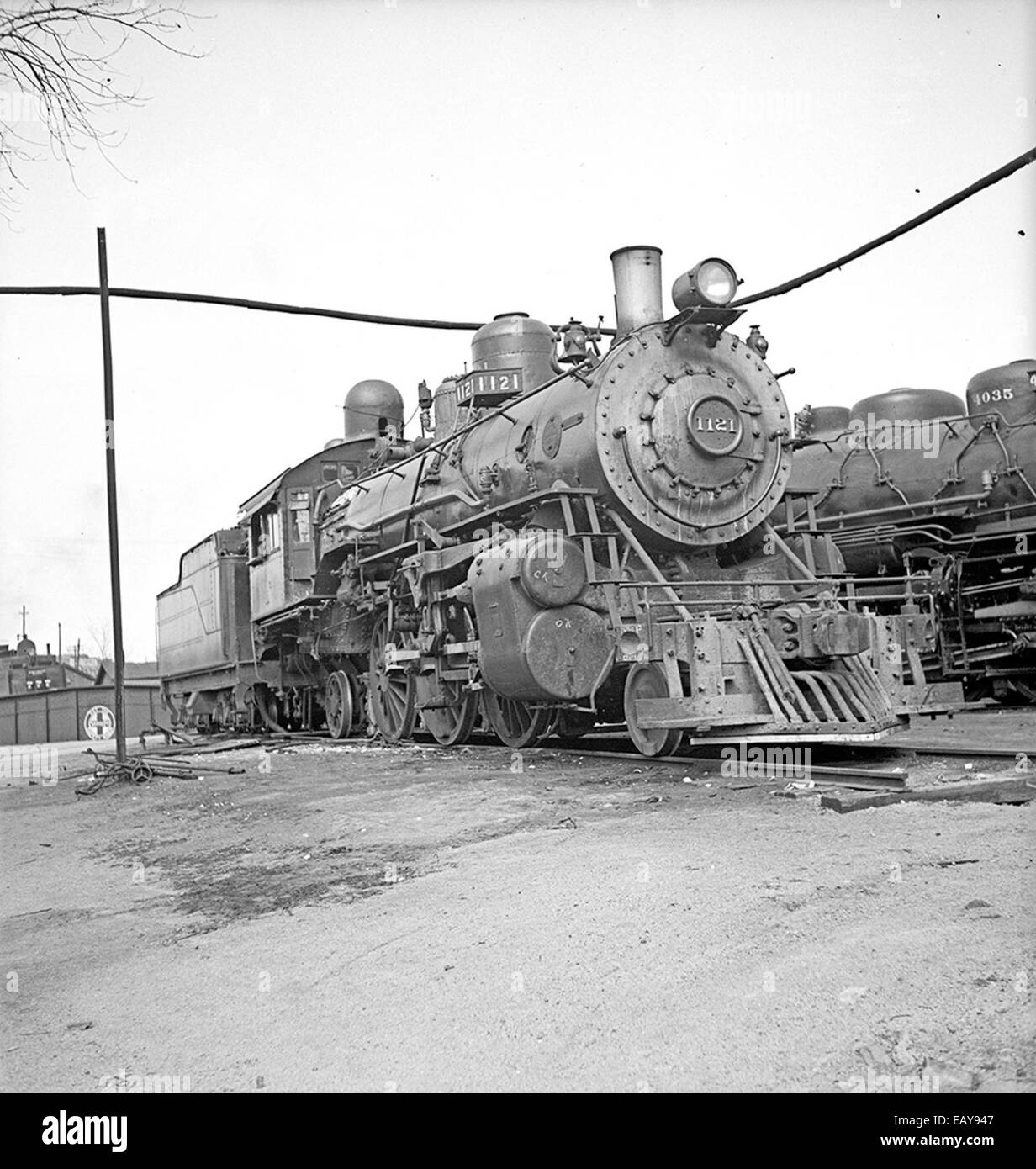 Atchison, Topeka & Santa Fe Locomotive No. 1121 with its tender, a ...