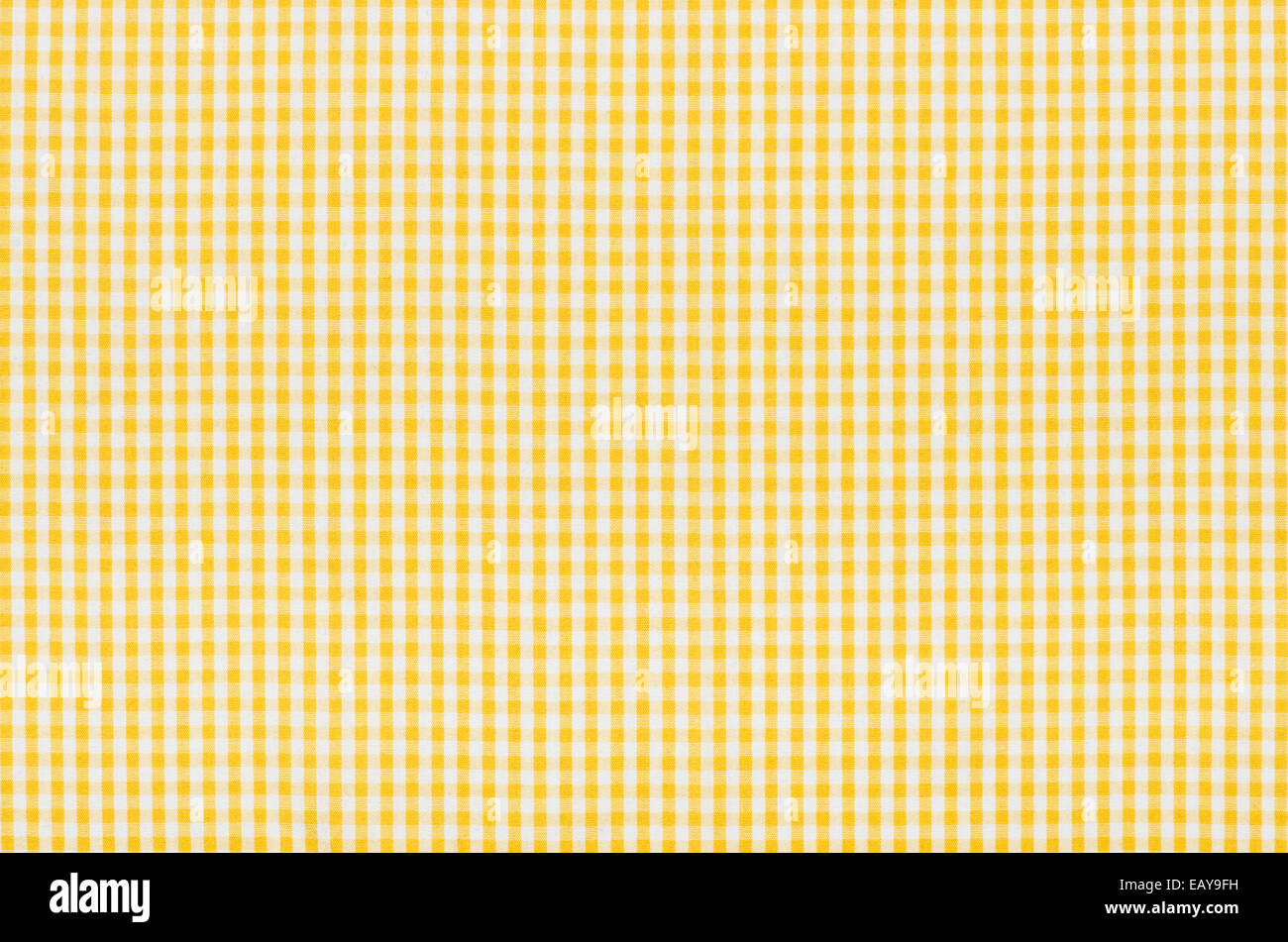 Yellow and white checkered fabric Stock Photo - Alamy