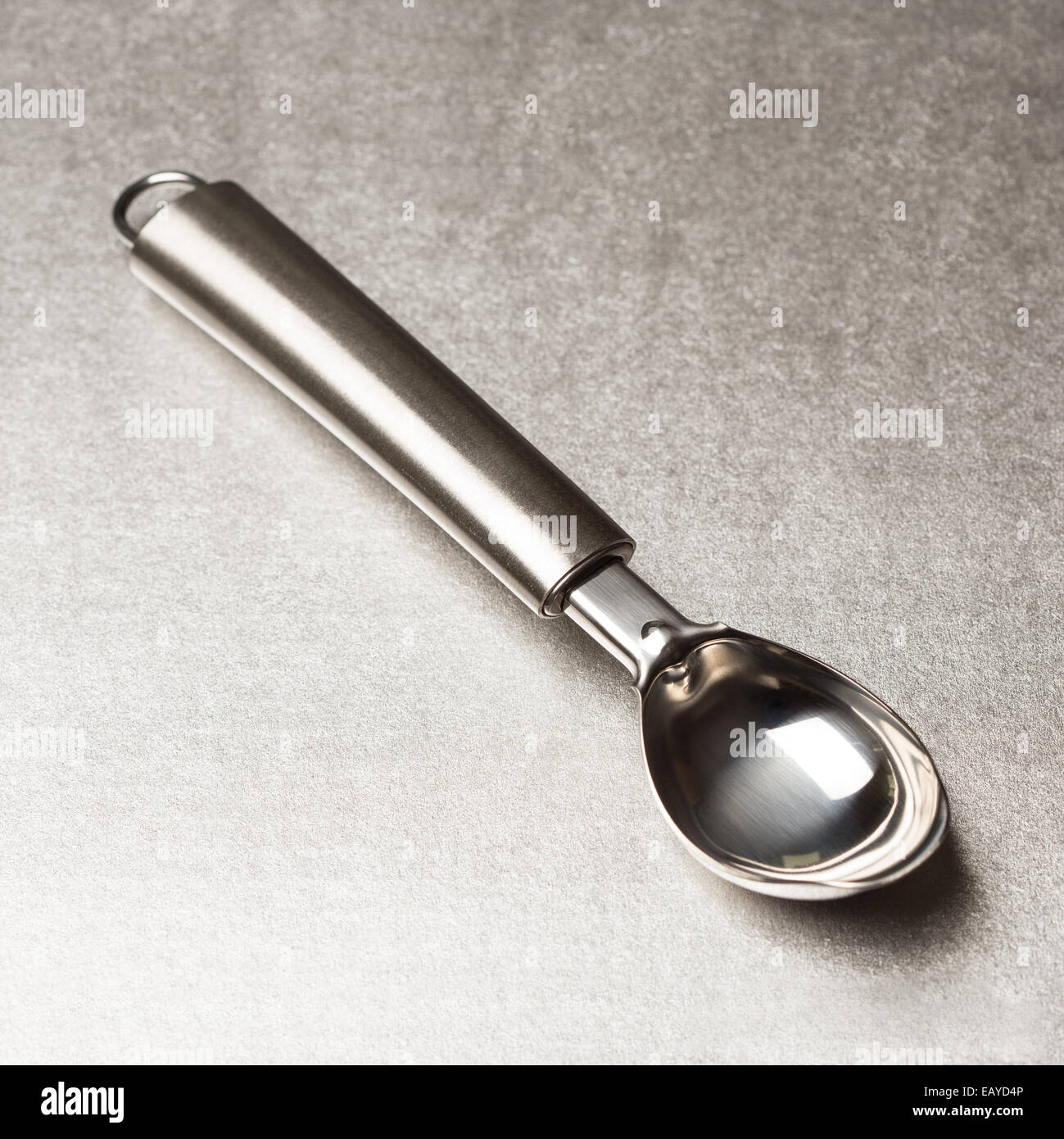Steel ice cream scooper Stock Photo - Alamy