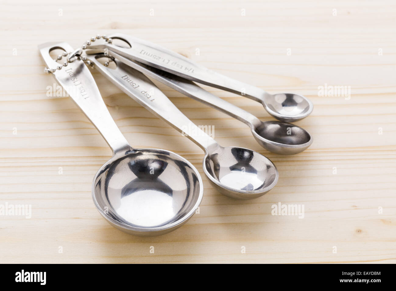 Measuring cups and spoons on the table Stock Photo - Alamy