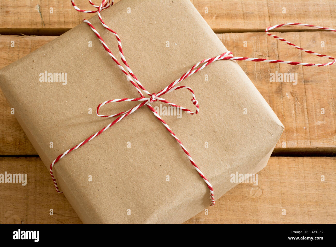gift box wrapped in recycled paper, with ribbon bow, with ribbon rustic ...