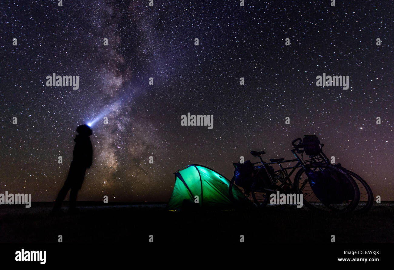 Man standing under stars at night hi-res stock photography and images ...