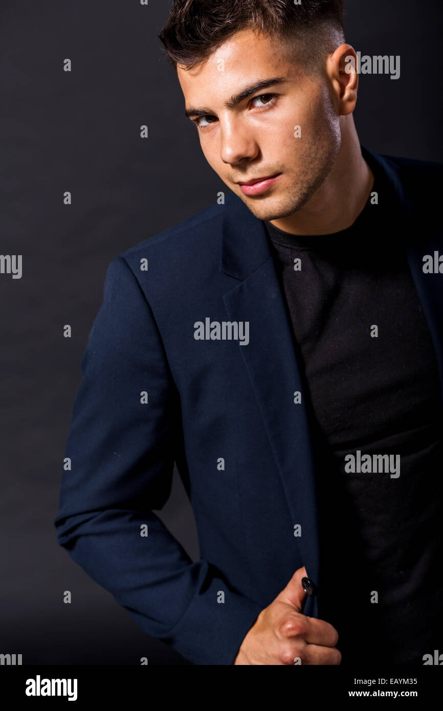 Young man in studio Stock Photo - Alamy