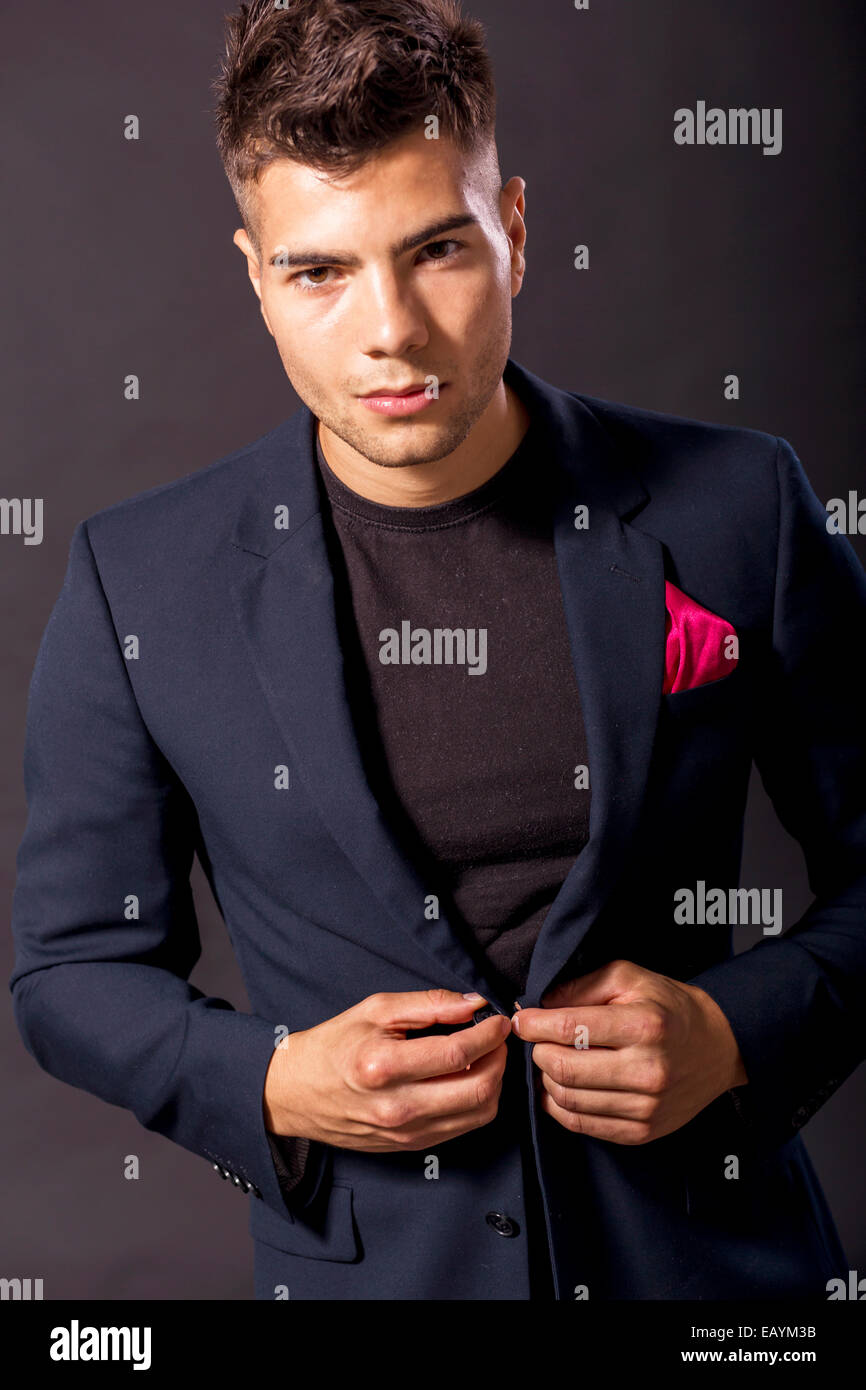 Young man in studio Stock Photo - Alamy