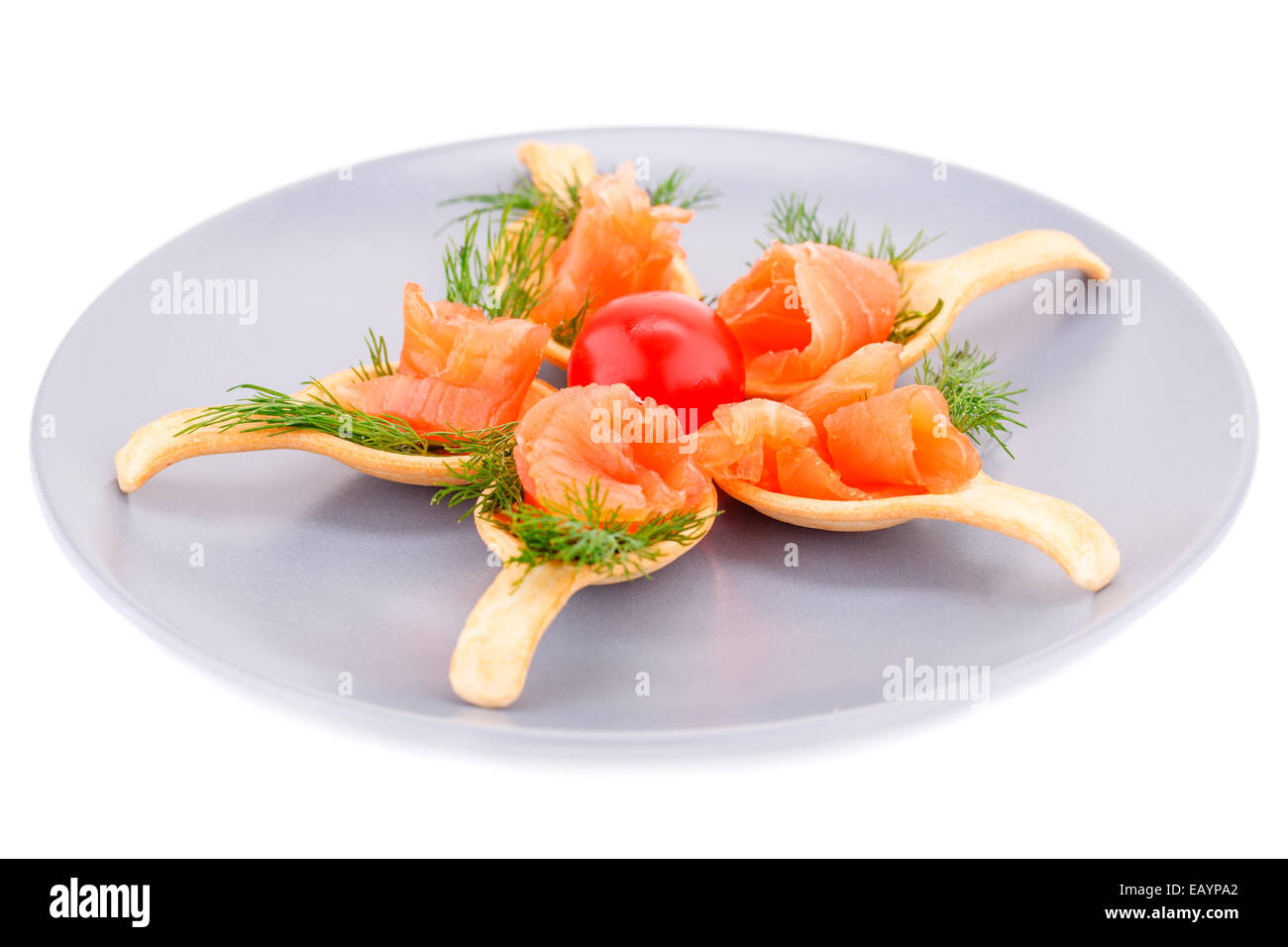 Salmon rolled fillet in pastries on plate Stock Photo - Alamy