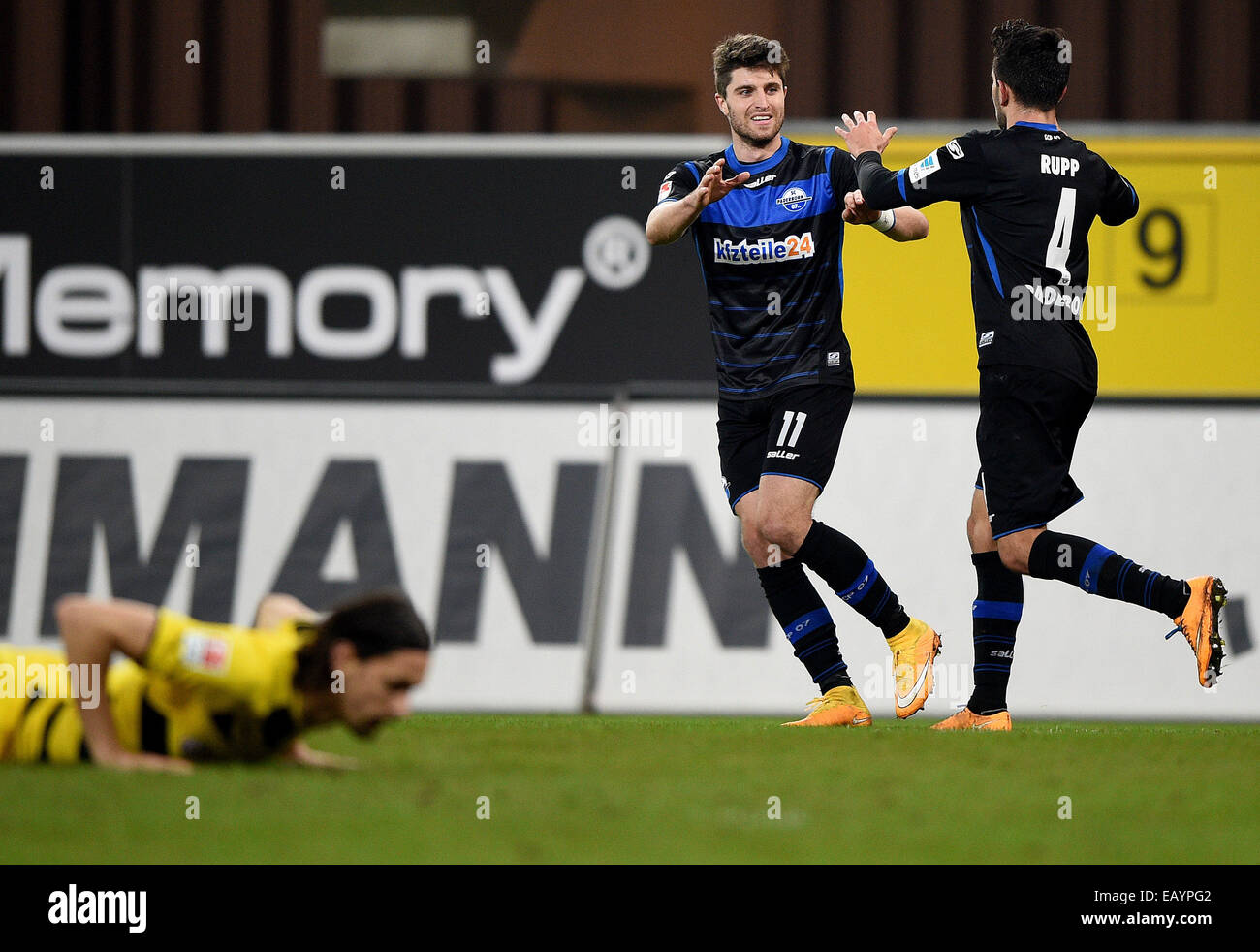 Paderborn, Germany. 22nd Nov, 2014. Paderborn's Lukas Rupp (R ...