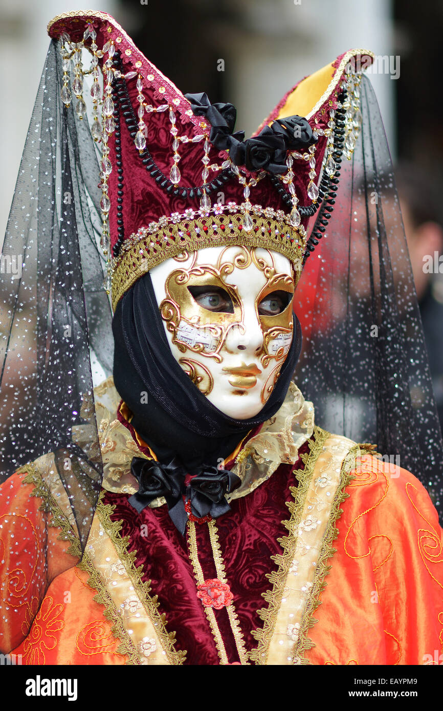 Woman with colorful costume and mask, Carnival Venice, Italy Stock ...