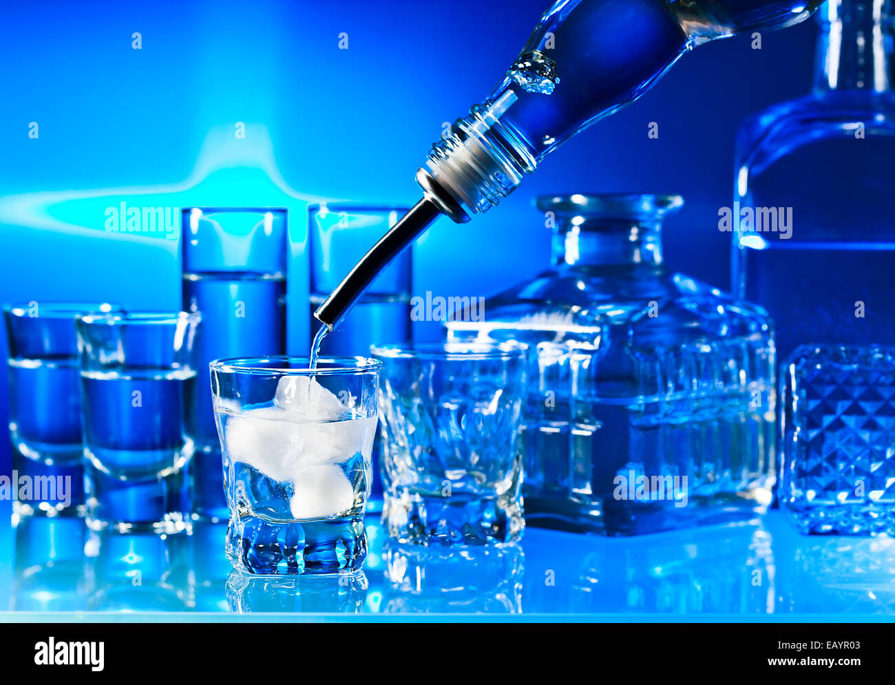 vodka in bar on a glass table Stock Photo - Alamy