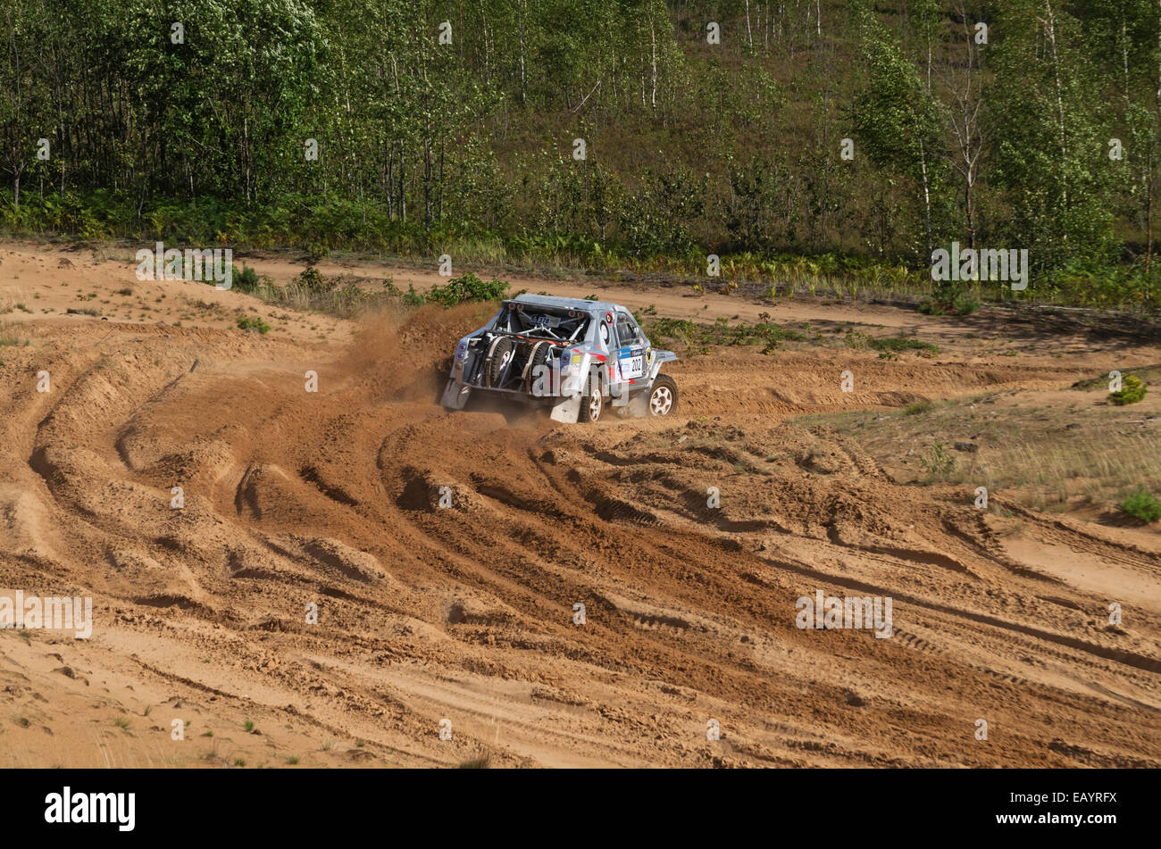 Races on a rally-raid on sandy dunes. Rally-raid Baha "Belarus" 2014 ...