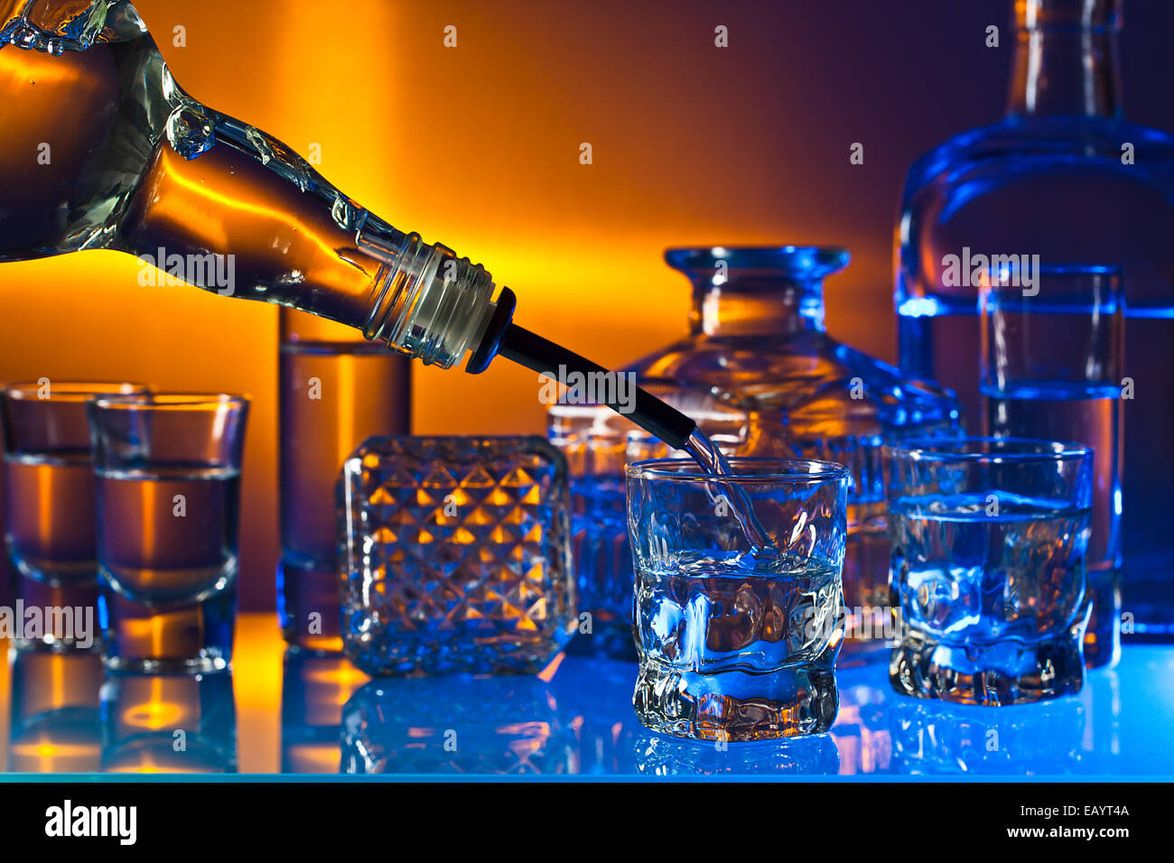 vodka in bar on a glass table Stock Photo - Alamy