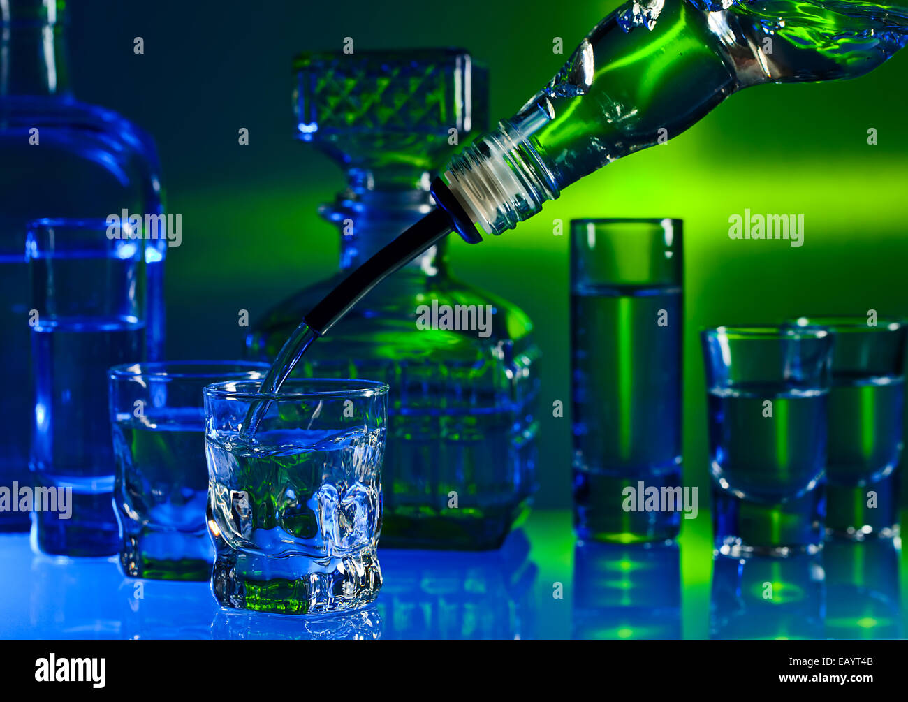 vodka in bar on a glass table Stock Photo - Alamy