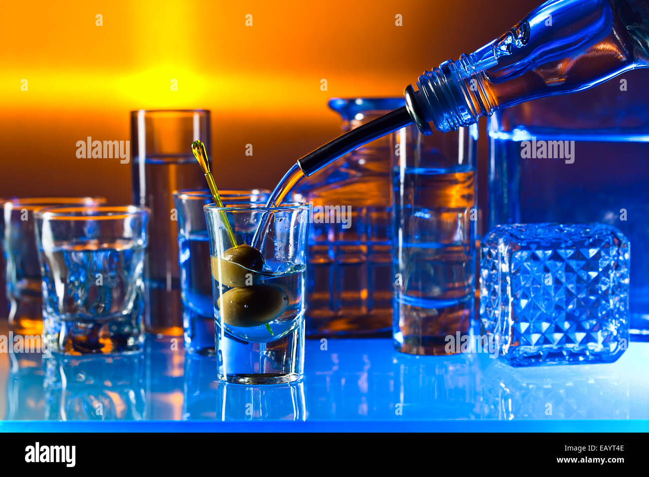 vodka in bar on a glass table Stock Photo - Alamy