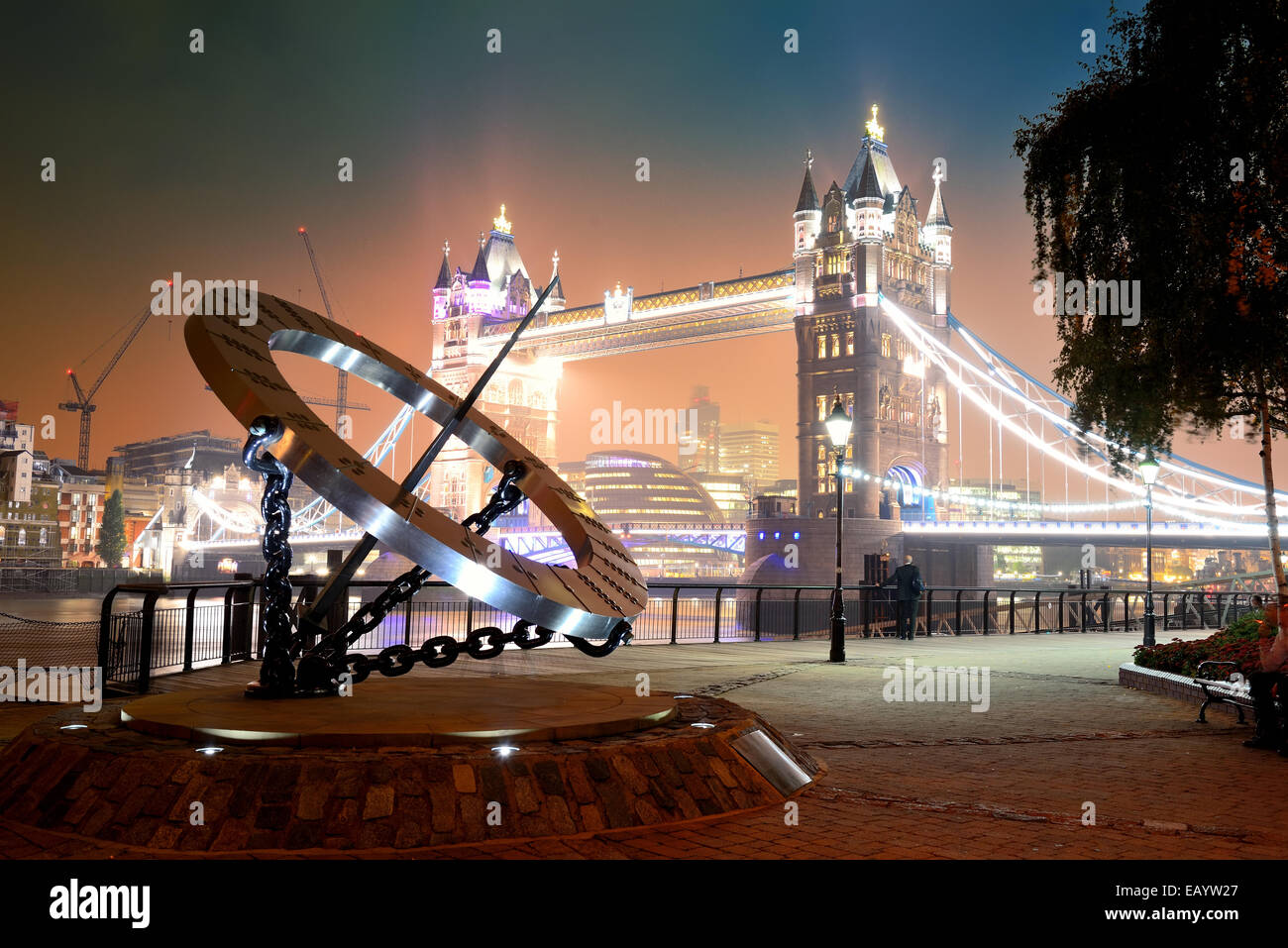 Sundial and Tower Bridge at waterfront in London Stock Photo - Alamy
