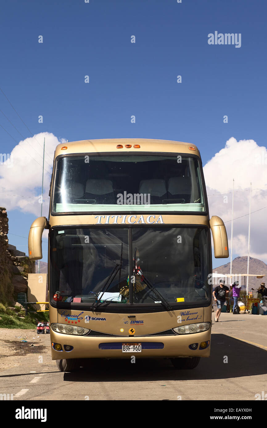 Long-distance bus standing on the roadside in the small border town of ...