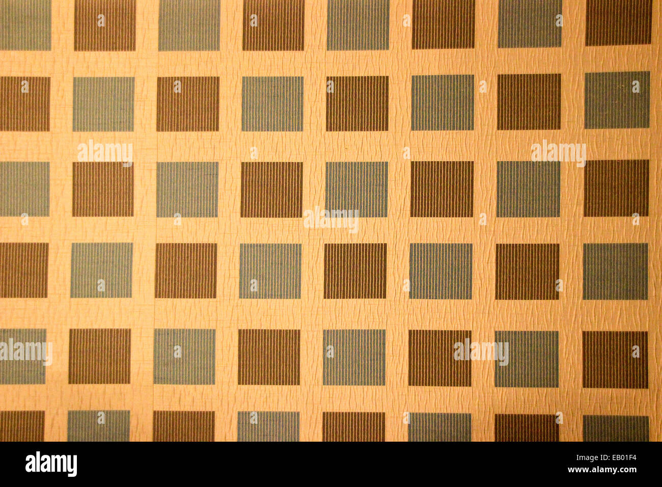 Neatly pressed, beautiful bed spread with square checkered pattern ...