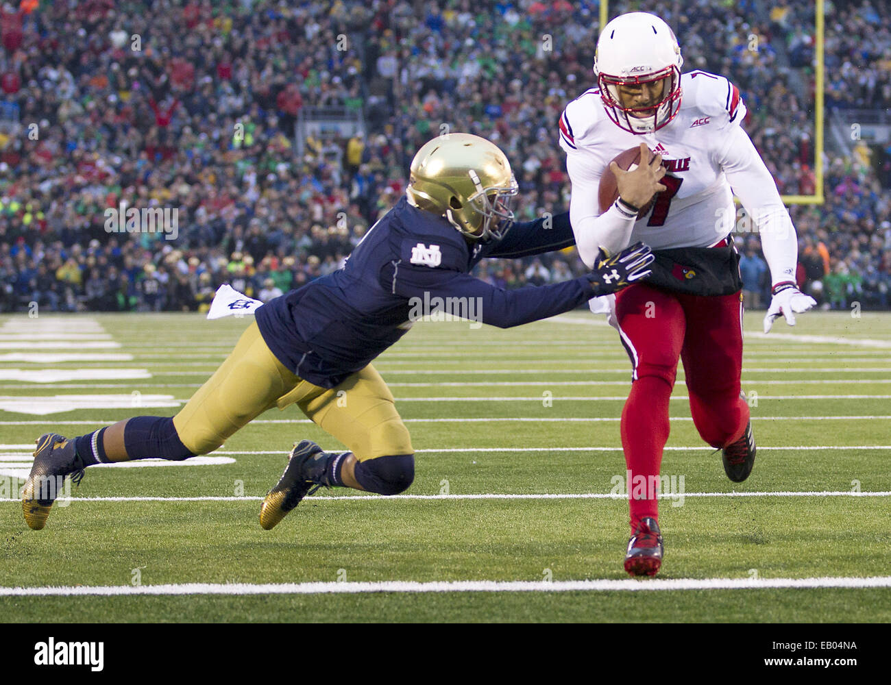 South Bend, Indiana, USA. 22nd Nov, 2014. Louisville quarterback Reggie ...