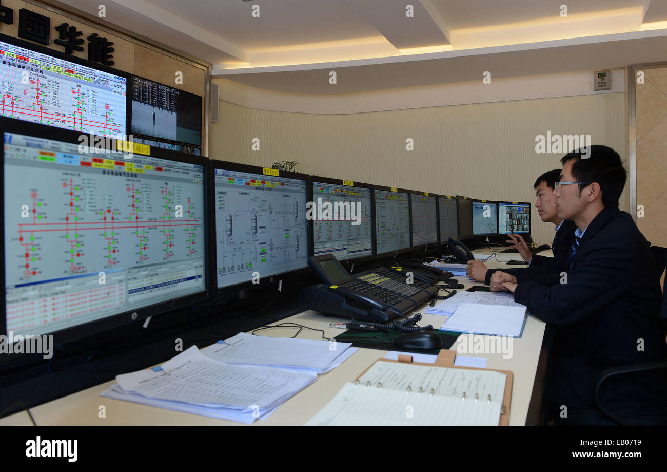 Gyaca, China's Tibet Autonomous Region. 22nd Nov, 2014. Staff members ...