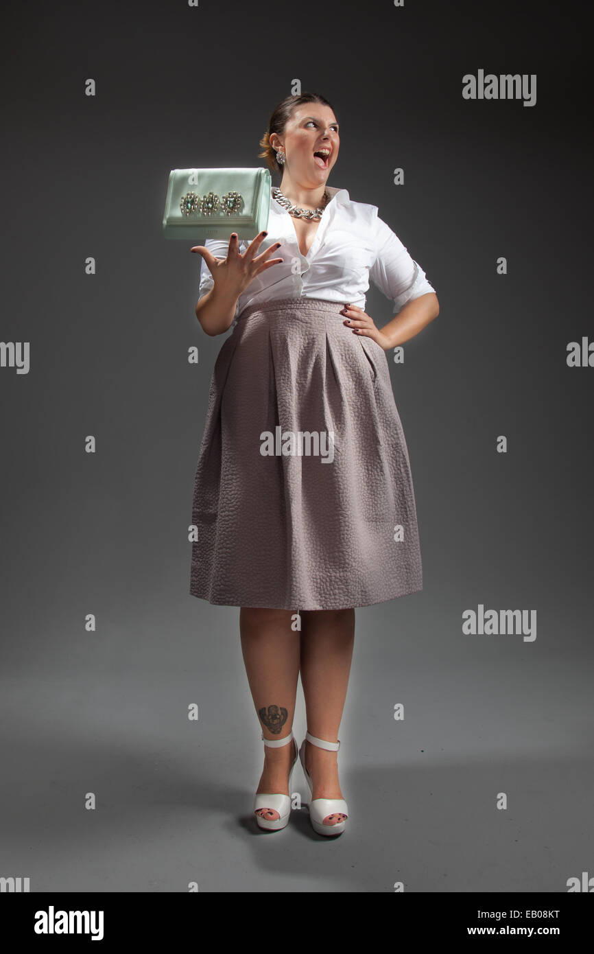 plus-size model fashion shot in studio Stock Photo - Alamy