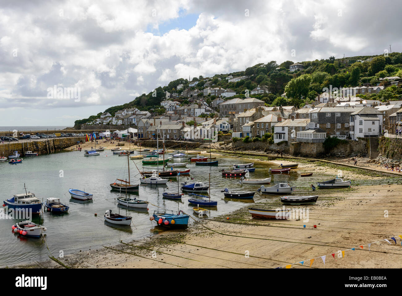 Musehole harbour, Cornwall, low tide in harbor of historic village of ...