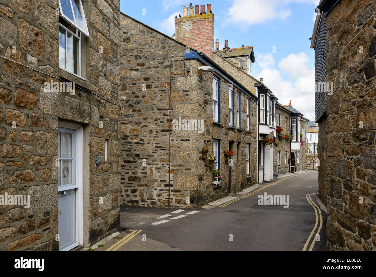 old street at Musehole, Cornwall, view of old buildings in street of ...
