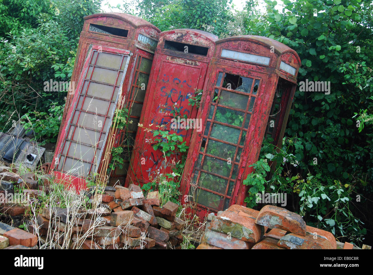derelict classic red phone boxes Stock Photo - Alamy