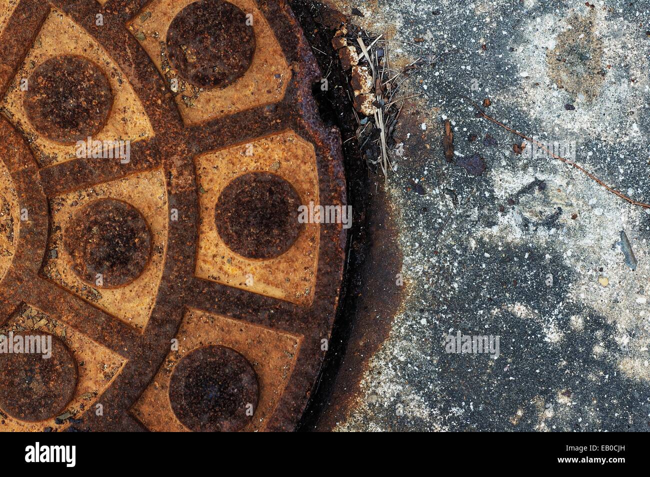 closeup of round shape rusty manhole Stock Photo - Alamy