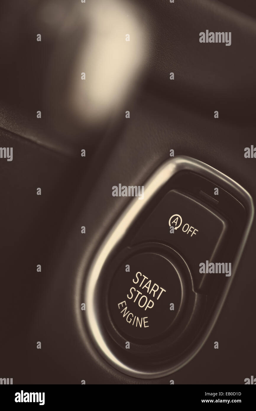 Detail on a black start button in a car Stock Photo - Alamy