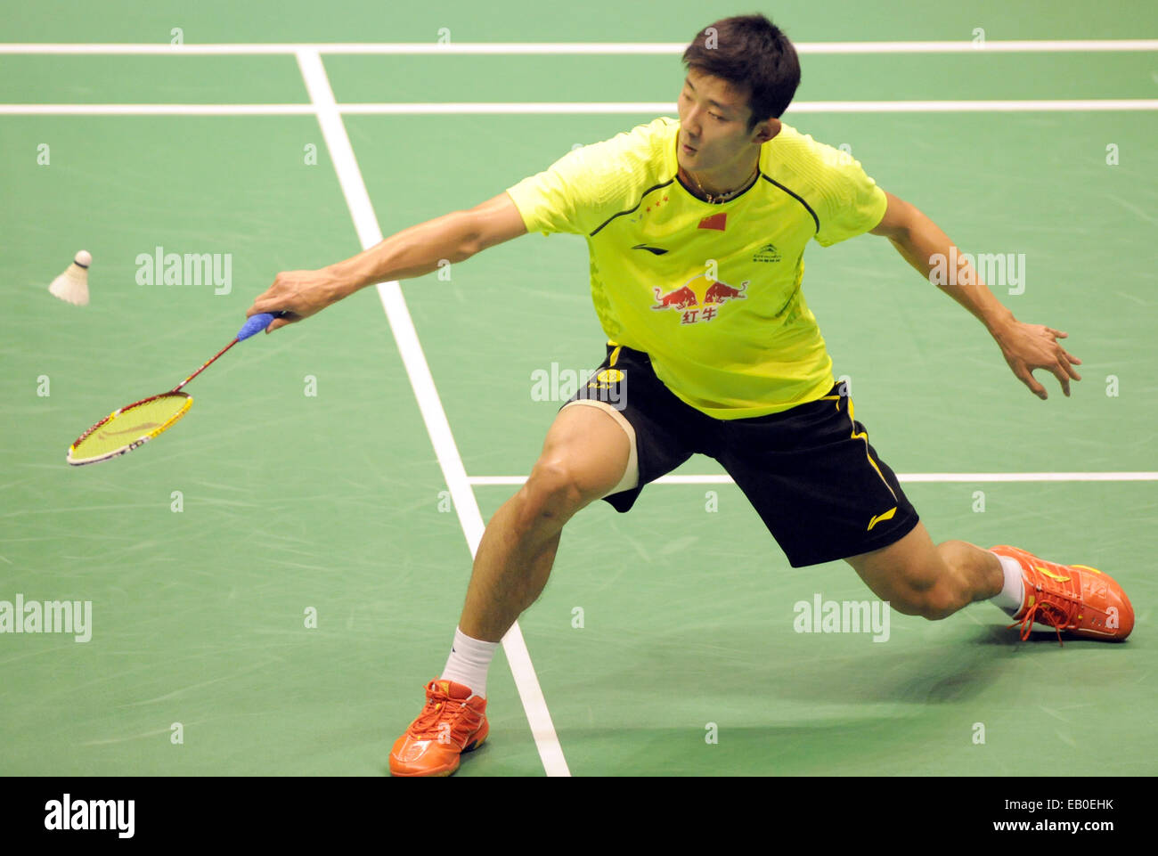Hong Kong, China. 23rd Nov, 2014. Chen Long of China returns the ...