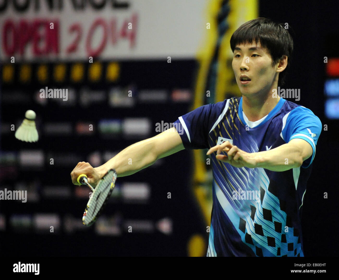 Hong Kong, China. 23rd Nov, 2014. Son Wan Ho of South Korea serves during his men's singles ...