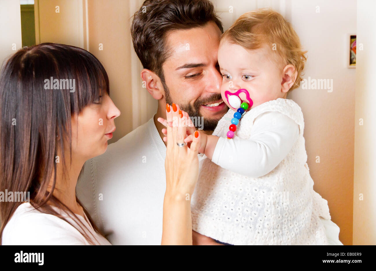 Happy family at home Stock Photo - Alamy