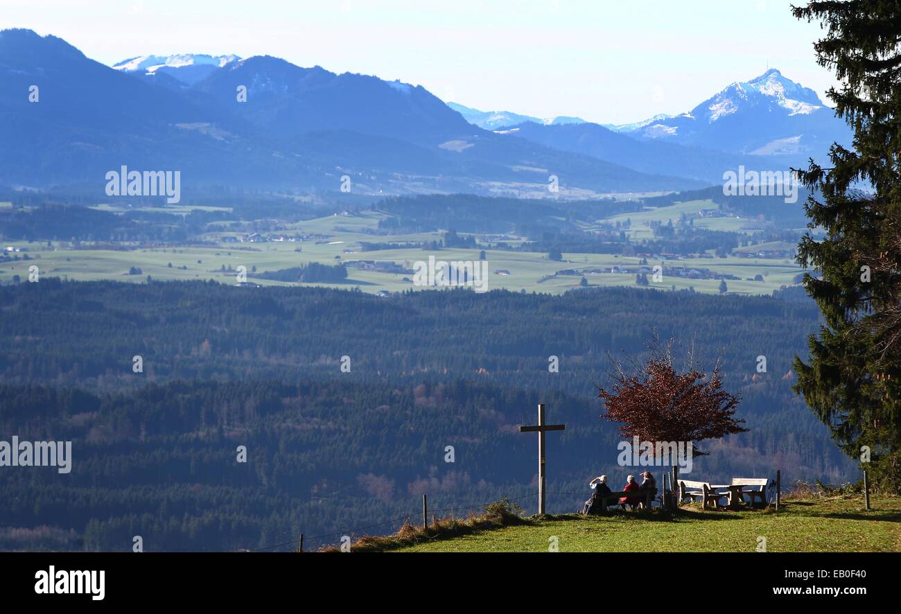 Excursionists enjoying the view of the Alpine panorama from the ...