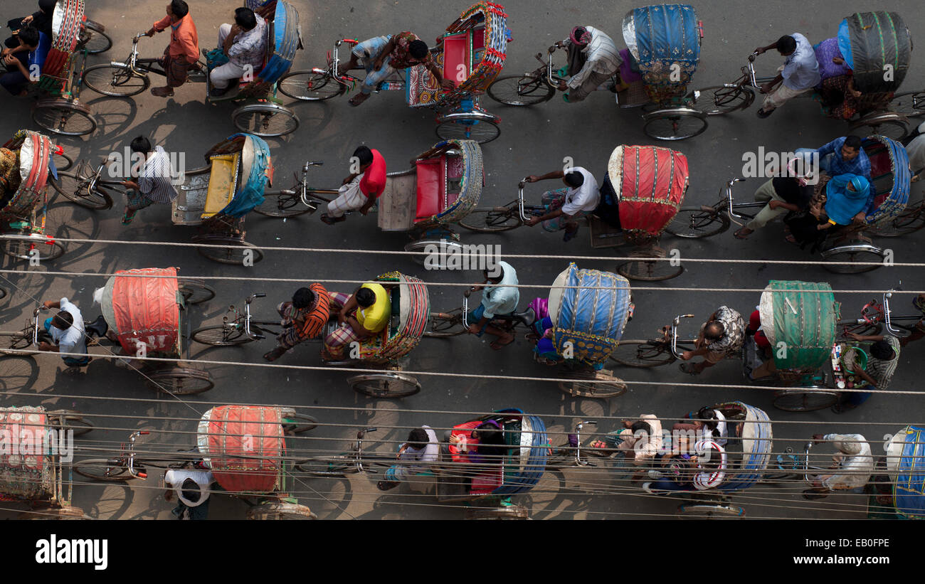 Dhaka,Bangladesh. 23rd November, 2014. A busy Rickshaw way in Dhaka ...