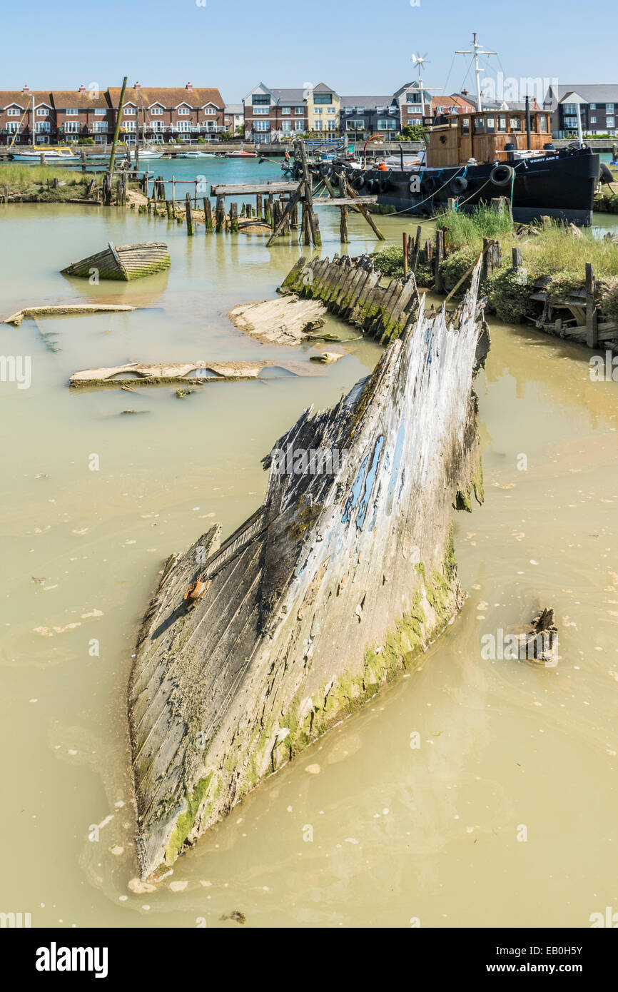 The sunken wreck of a boat on the west side of the River Arun ...