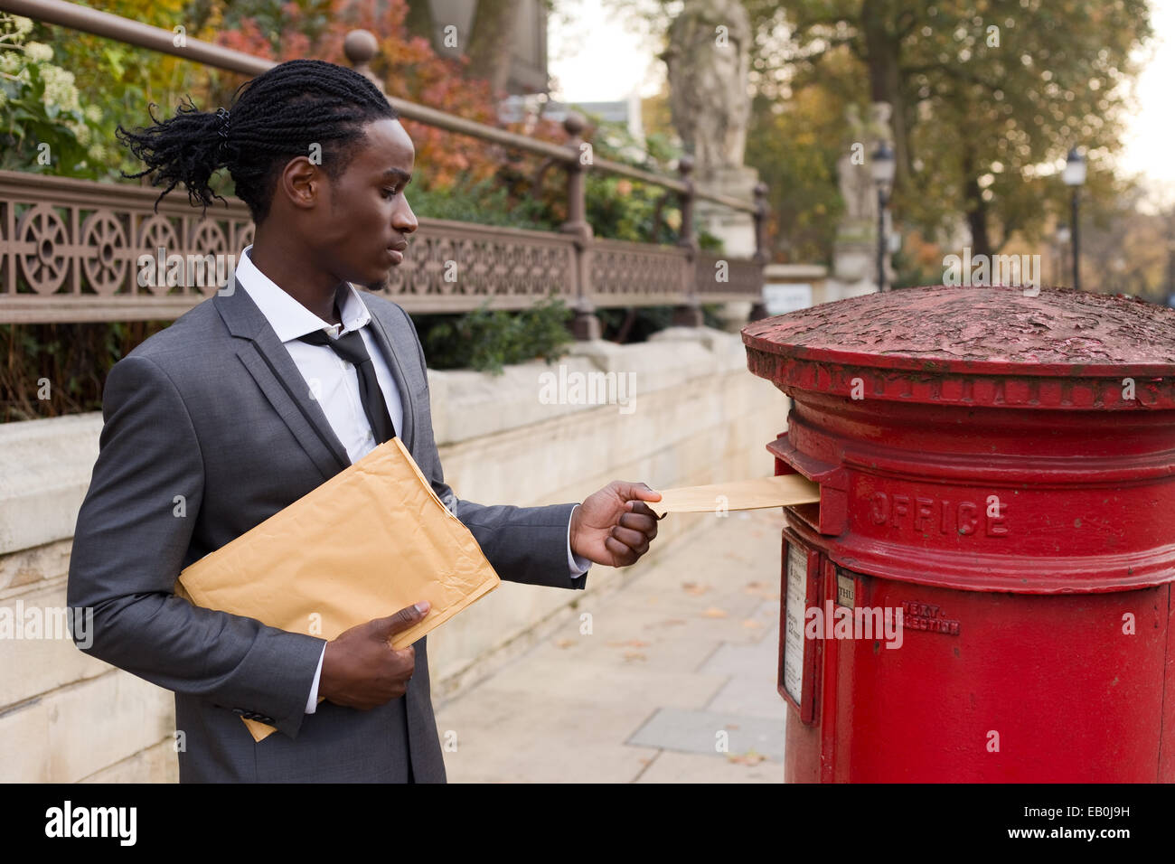 business man sending letters Stock Photo - Alamy