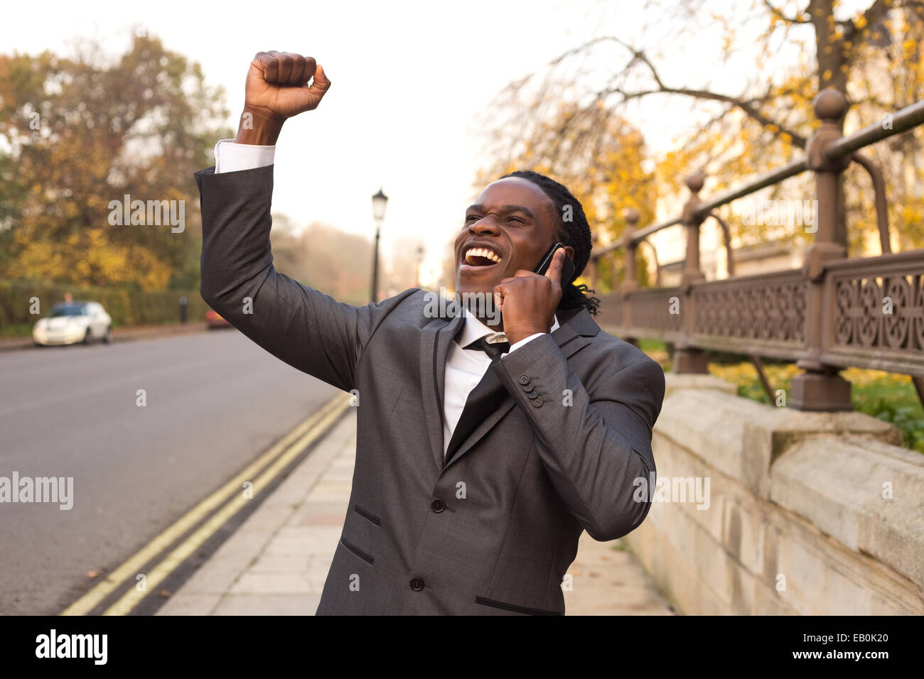 Excited adult man celebrating success hi-res stock photography and ...